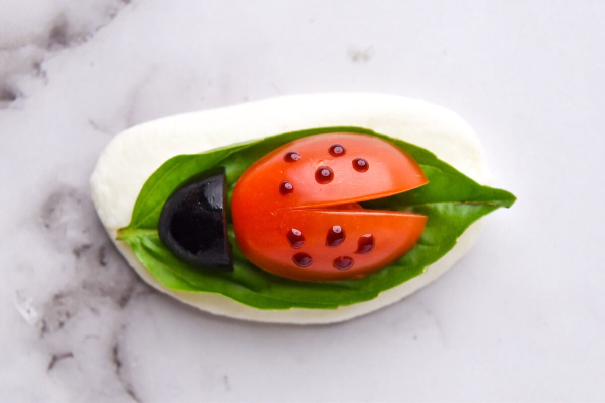 Adorable Caprese Salad Ladybugs are a Fun Party Appetizer!